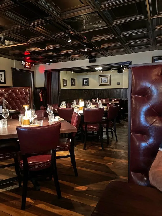 Step inside and time stands still. Rich wood paneling, burgundy leather, and soft lighting create the kind of atmosphere where deals are made and anniversaries celebrated.
