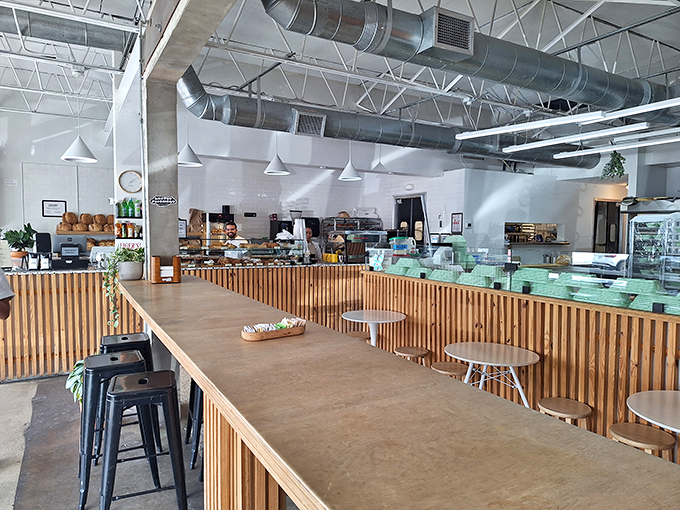 Clean lines, wooden accents, and that heavenly bakery aroma – Caracas Bakery's interior is where minimalist design meets maximum flavor potential.