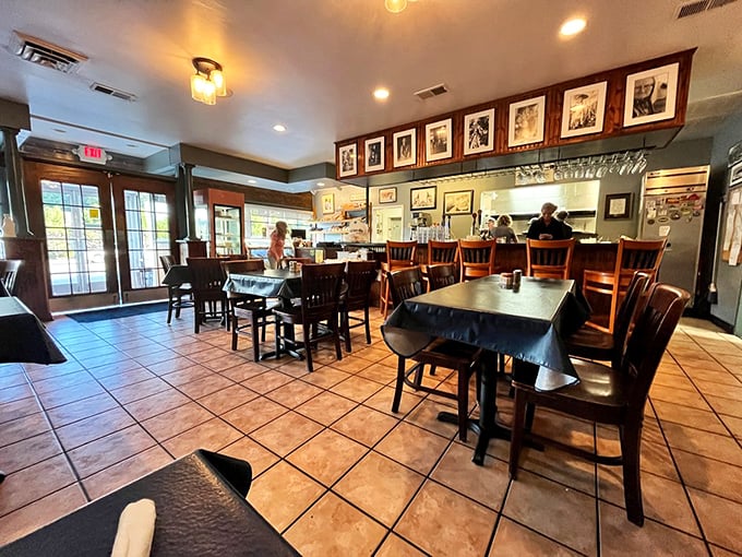 Wooden chairs, tiled floors, and framed memories create that "everybody knows your name" vibe that makes comfort food taste even better.
