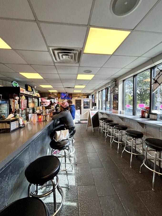 Classic counter seating where culinary dreams come true. This isn't fine dining—it's something better: a front-row seat to Philadelphia's tastiest show.