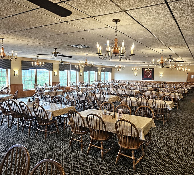 Wooden chairs, simple tablecloths, and chandeliers create the perfect backdrop for breakfast magic. This dining room has witnessed more food epiphanies than a cooking show marathon.