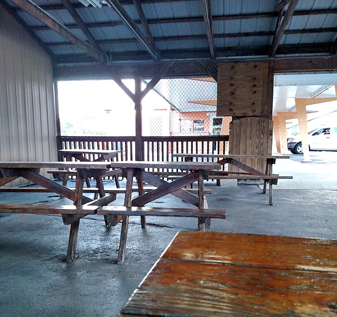 Wooden picnic tables that have witnessed thousands of first dates and family outings wait patiently under the shelter, ready for another season of root beer-fueled memories.
