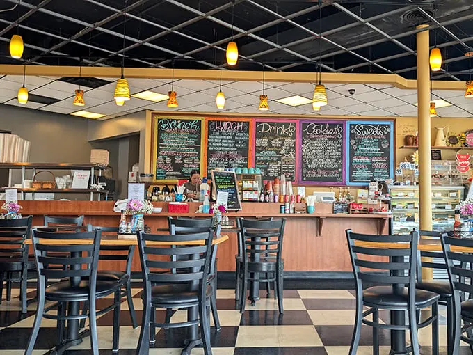Colorful chalkboard menus and pendant lighting create that "where everybody knows your name" vibe. The checkered floor practically begs you to stay awhile.