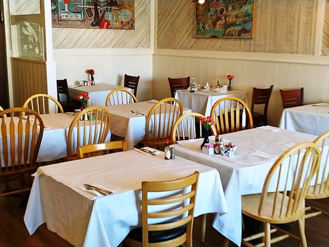 Simple wooden chairs and white tablecloths create the perfect stage for the real star of the show—that legendary chowder.