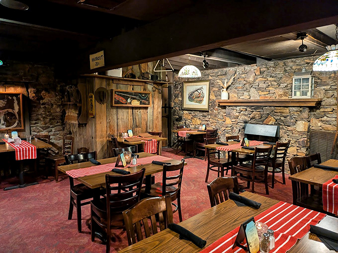 Inside, stone walls and wooden beams create a dining room that feels like a secret hideaway. Grandma would approve of those red-checkered tablecloths.