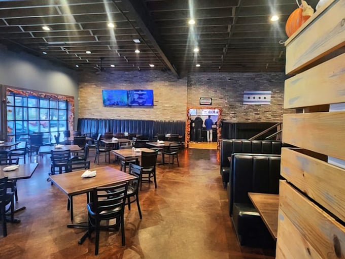 Where rustic meets refined—exposed brick walls, polished concrete floors, and comfortable seating create the perfect backdrop for food-induced euphoria.