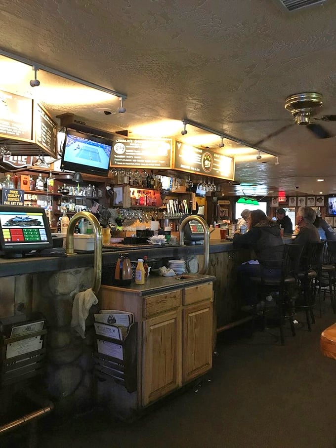 The bar at Charlie Clark's feels like the living room of that friend who always has the best stories—and the best drinks to go with them.