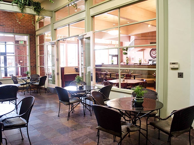 Sunlight streams through floor-to-ceiling windows, creating the perfect ambiance for savoring your morning coffee and contemplating life's great mysteries.