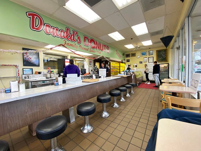 Classic diner vibes meet serious donut craftsmanship in this retro wonderland of sweet possibilities.