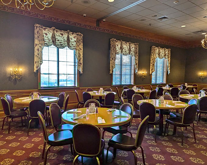 Elegant yet unpretentious dining areas await hungry pilgrims, where chandeliers cast a warm glow over tables soon to be laden with edible treasures.