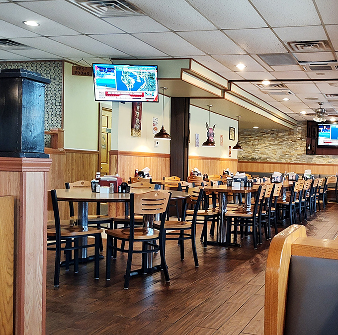 Wood paneling, comfortable seating, and that unmistakable diner ambiance – it's like stepping into a Norman Rockwell painting where calories don't count.