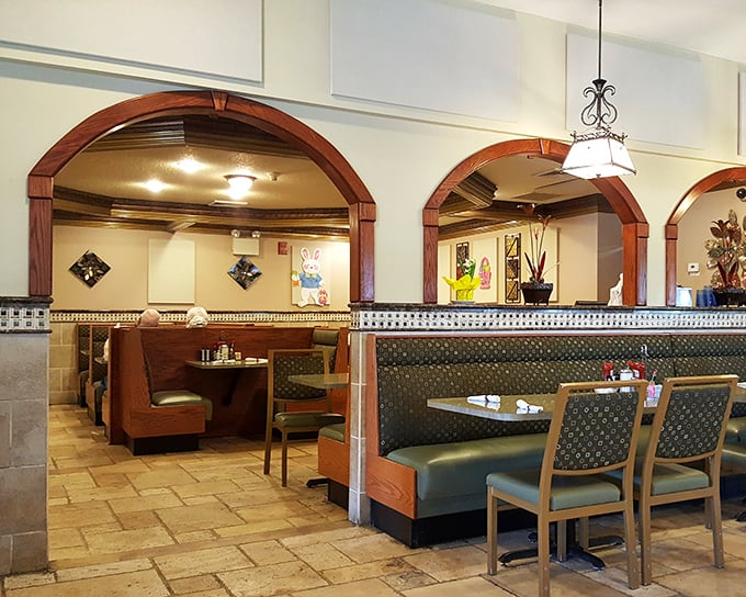 Step inside and you're transported to diner nirvana – wooden arches, cozy booths, and that unmistakable feeling that good things are about to happen to your taste buds.