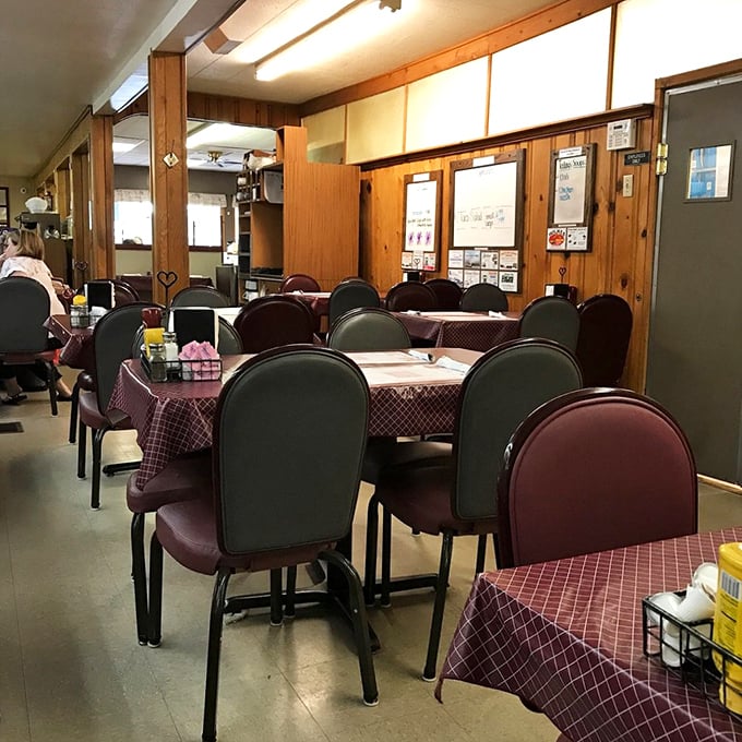 Step inside where checkered tablecloths and honest comfort create the perfect dining symphony.