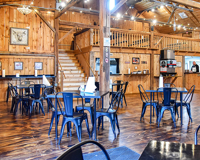 Those barn-style beams and blue chairs create the perfect no-nonsense backdrop for serious barbecue business.