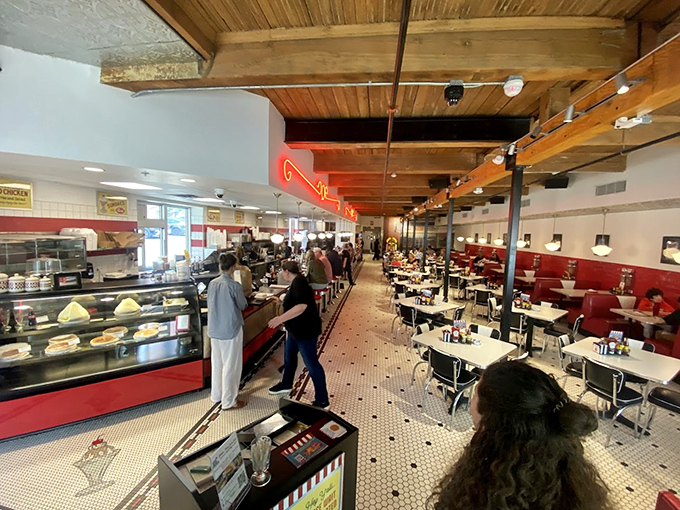 Step inside and the decades melt away—red vinyl booths, gleaming countertops, and a bustling soda fountain create the backdrop for memories waiting to happen.
