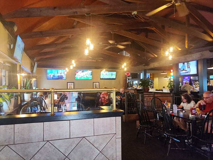Exposed wooden beams and warm lighting create the perfect atmosphere for plotting your next meal. No prison-grade ambiance here!