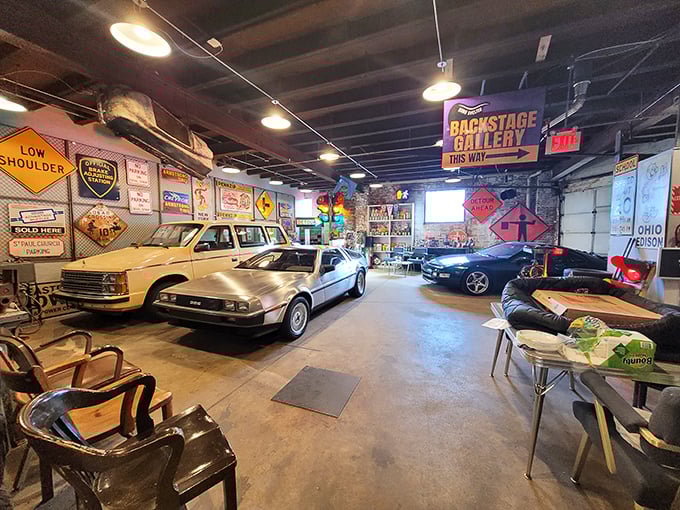 Welcome to the "Backstage Gallery," where classic cars aren't museum pieces—they're waiting for their next adventure. That DeLorean is practically begging for a road trip.