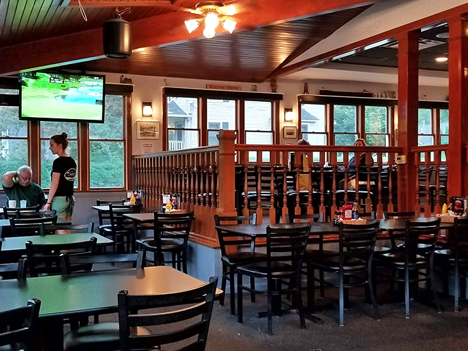 Warm wood tones, natural light, and that unmistakable "everybody knows your name" vibe—Jake's dining room feels like the neighborhood living room we all wish we had.