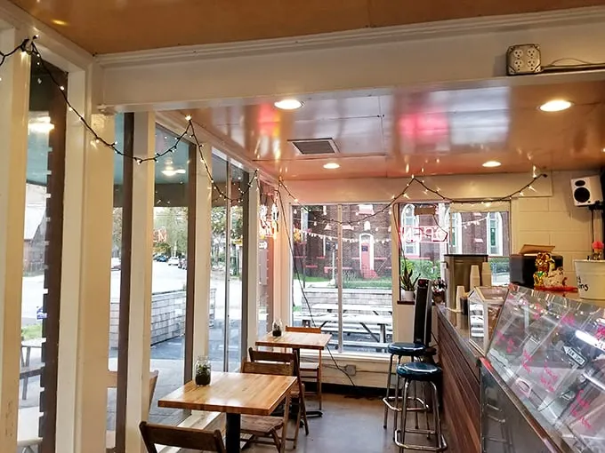 Inside, minimalist charm meets ice cream wonderland. The string lights and simple furnishings let the real star—those handcrafted flavors—take center stage.