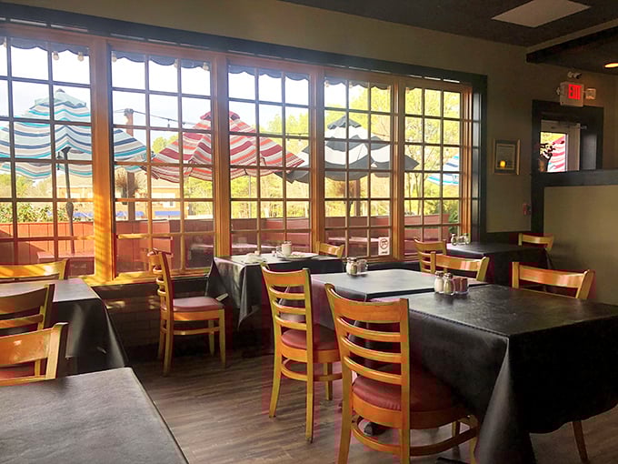 Sunlight streams through windows, bathing wooden tables in golden light. This isn't just dining—it's therapy with tablecloths.