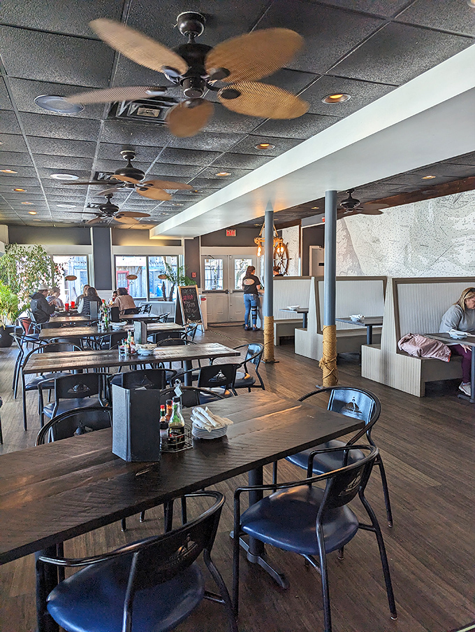 Inside, ceiling fans lazily spin above wooden tables where seafood dreams come true. The dining room's casual vibe whispers, "Stay awhile, the tide's not rushing."