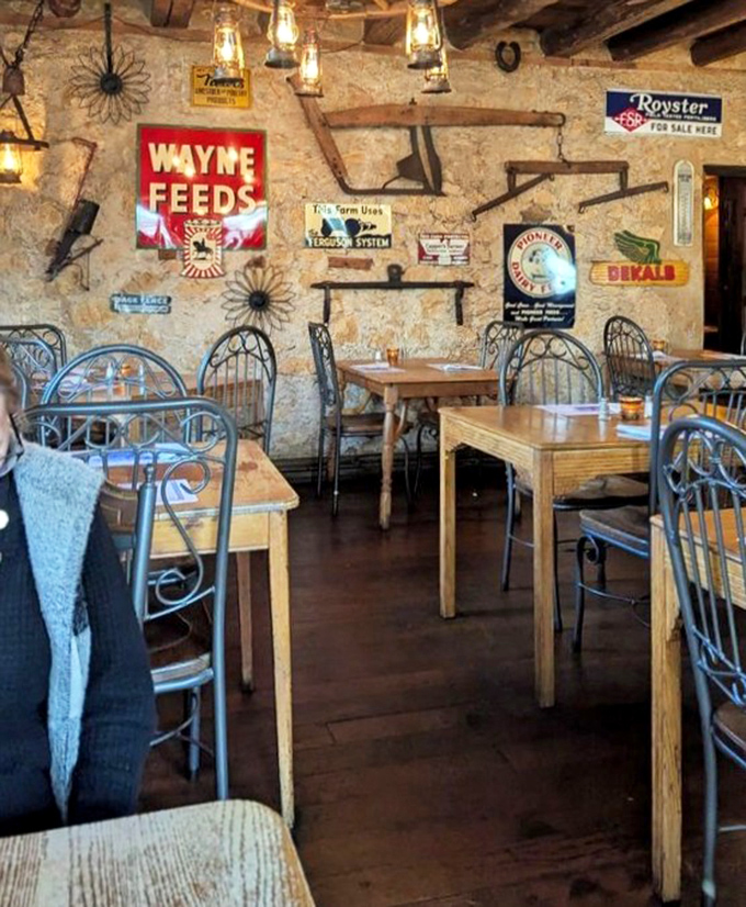 Not just decoration—these vintage farm signs tell the story of Wisconsin's agricultural heritage while you dine among history.