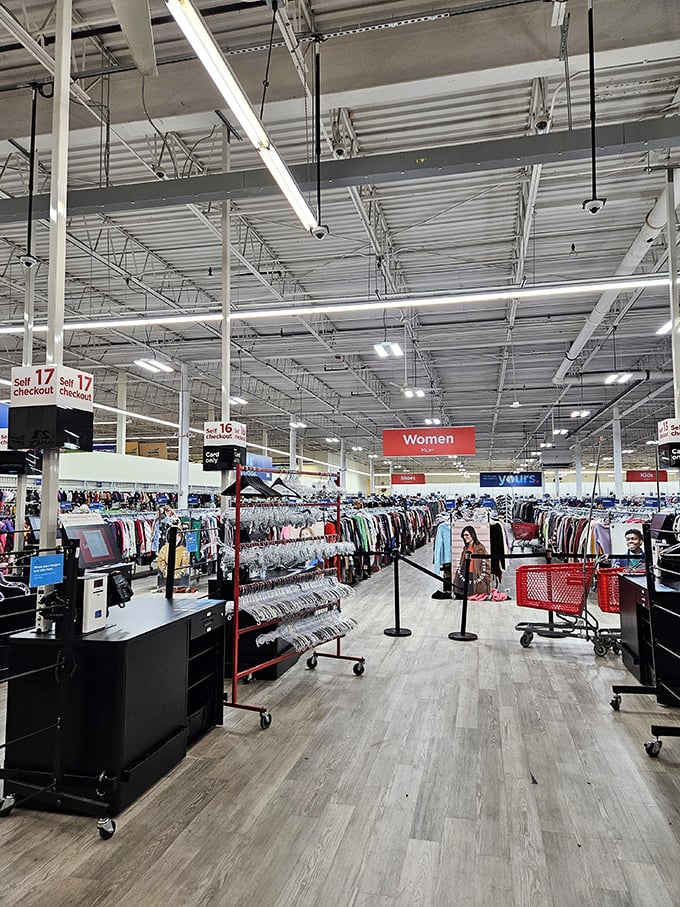 Endless racks stretch toward industrial ceilings like a retail Grand Canyon. This isn't shopping—it's an expedition requiring comfortable shoes and determination.