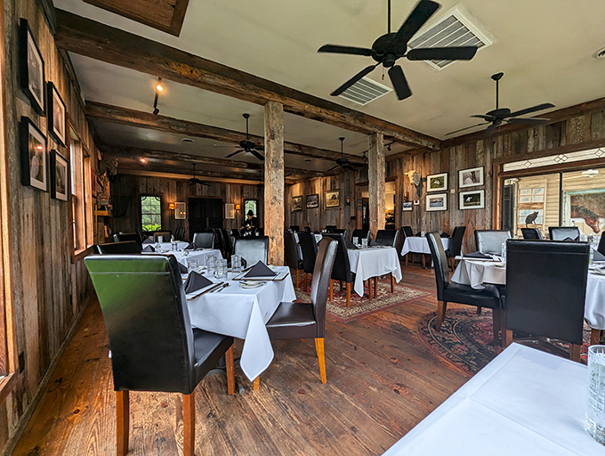 Step inside and time slows down – rustic wooden beams, crisp white tablecloths, and that unmistakable steakhouse aroma that whispers, "You've made a very good decision."