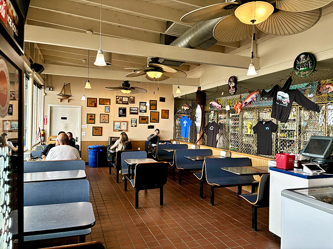 Inside, nautical charm meets casual comfort – where fishing memorabilia tells stories of ocean adventures while you wait for your coastal feast.