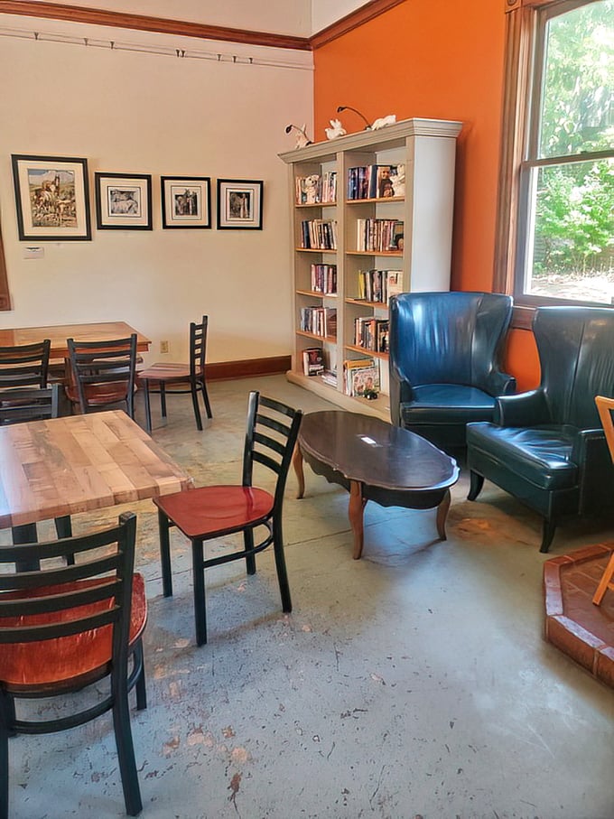 A reading nook that invites you to linger? This isn't just a bakery—it's the living room you wish you had, complete with books and comfy chairs.