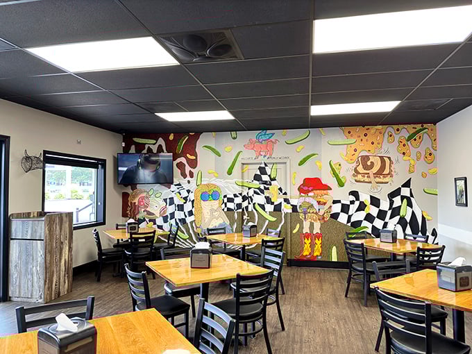Inside, whimsical wall art transforms a simple dining room into something special – like finding an unexpected jazz club in a quiet neighborhood.