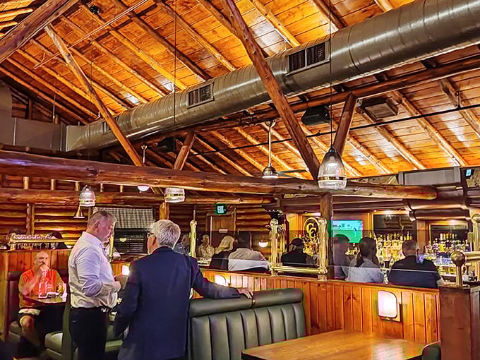 Exposed wooden beams and golden lighting create the perfect atmosphere for important life decisions, like whether to order a second bowl of bisque.