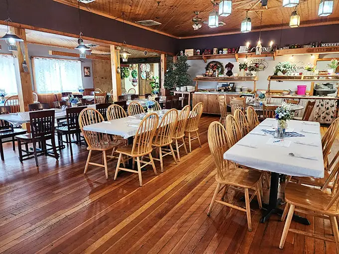 Wooden chairs, warm lighting, and tables set for feasting – this dining room doesn't need Instagram filters to feel like the coziest spot in Indiana.