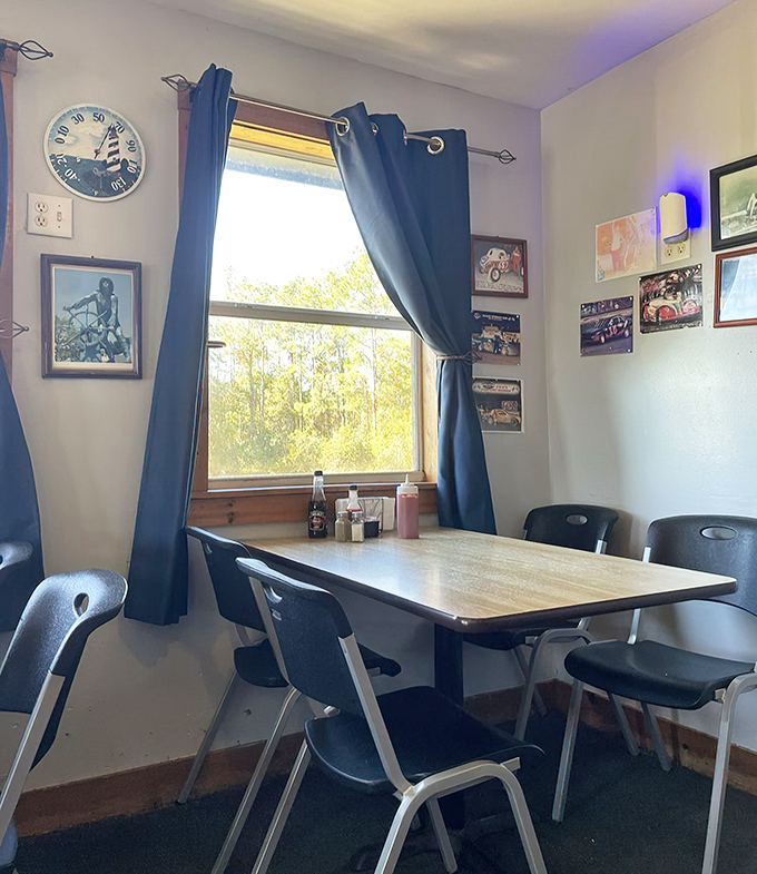 Simple tables, blue curtains, and a view of Florida greenery—this no-frills dining room lets the seafood do all the talking.