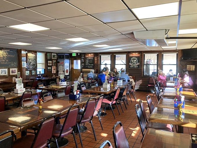 Red chairs, wooden tables, and walls adorned with maritime memories – Cantler's dining room feels like the living room of Maryland's seafood soul.