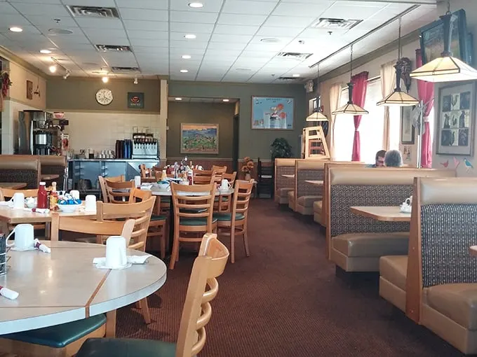 Classic diner ambiance done right—booths that have cradled countless conversations and wooden chairs that have supported generations of pancake enthusiasts.