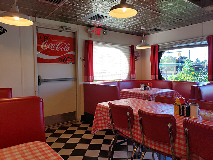 Red vinyl booths and checkered floors create the perfect backdrop for life's big decisions—like whether to order the pancakes or the French toast. (Correct answer: both.)