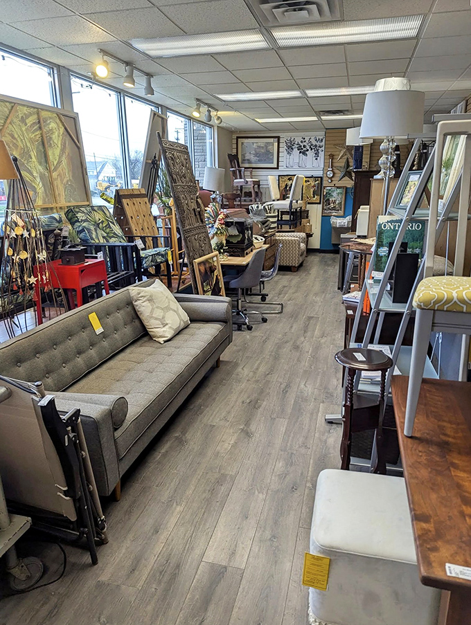 Mid-century modern meets contemporary chic in this carefully curated corner. That gray sofa is practically begging you to take it home for Netflix marathons.