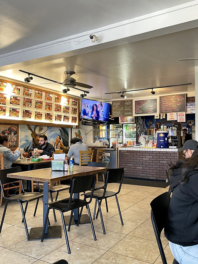Step inside where ceiling fans spin lazily above tables that have witnessed countless food epiphanies. 