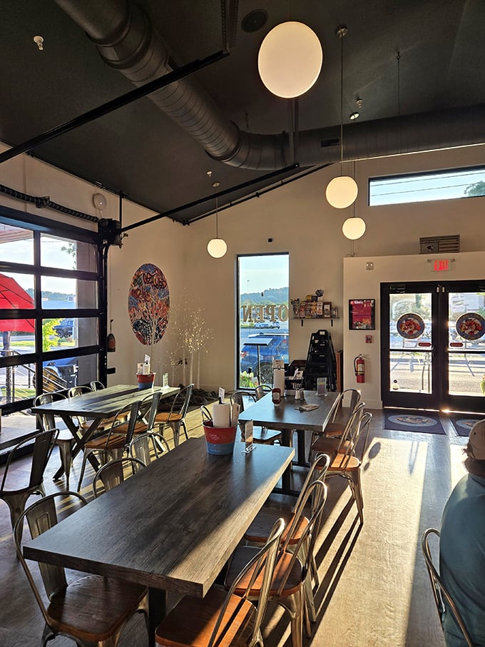 Industrial-chic meets seaside casual in Pinchy's airy interior. Those globe lights hanging from exposed ductwork create the perfect ambiance for serious seafood appreciation.