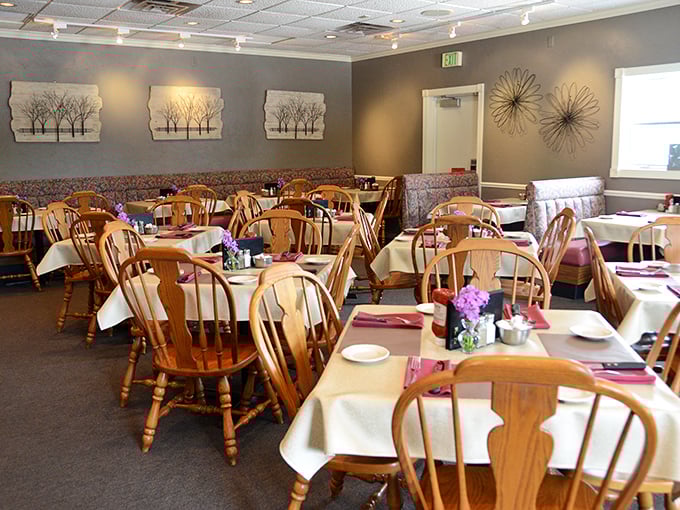 White tablecloths, wooden chairs, and serene wall art create that perfect Wisconsin supper club atmosphere—elegant without pretension, special without stuffiness.
