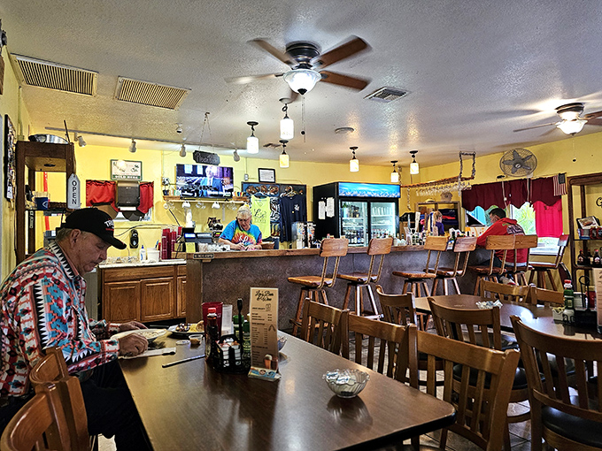Inside, wooden tables, counter seating, and yellow walls create that perfect "somebody's favorite aunt's kitchen" vibe where calories simply don't count.