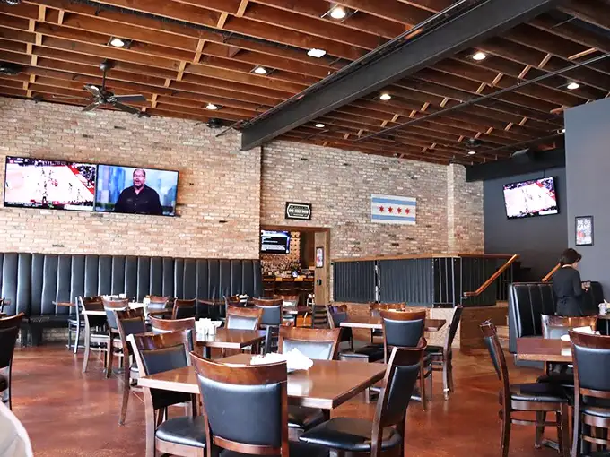 Exposed brick walls and wooden ceiling beams create the perfect backdrop for both casual weeknight dinners and those "I deserve this" splurges.