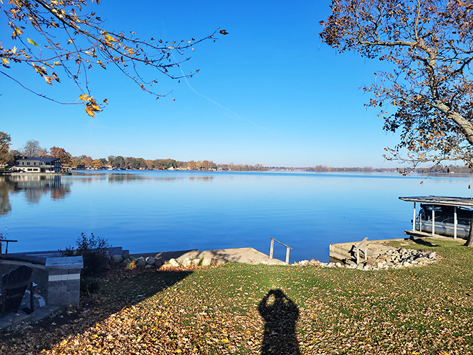 Autumn's golden touch transforms Indian Lake into a painter's palette, where every ripple catches sunlight like it's being paid overtime.