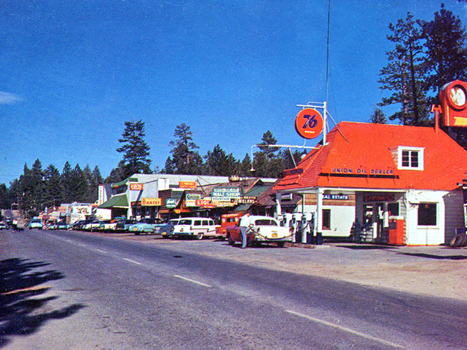 This vintage snapshot of Big Bear's main drag captures a simpler time when gas was cheap and mountain air was priceless.