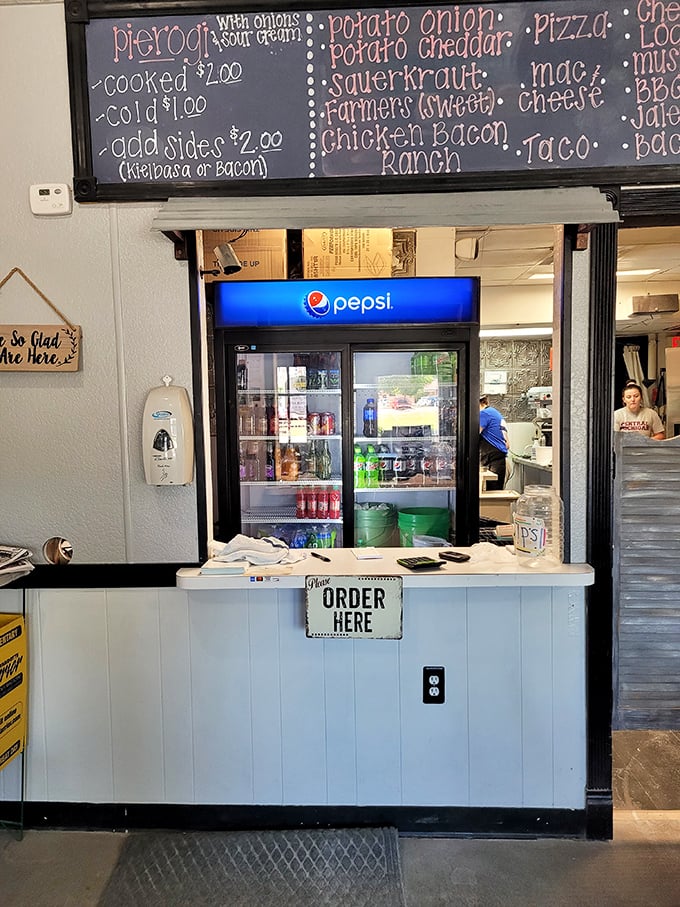 "ORDER HERE" – three simple syllables that stand between you and dumpling nirvana. Life's important decisions happen at this counter.