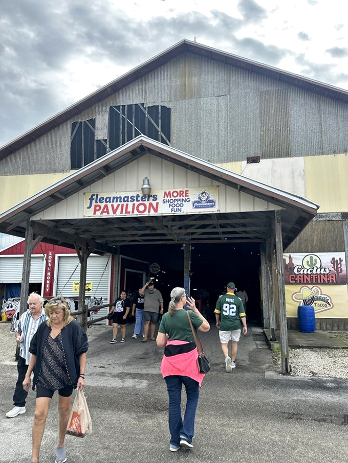 The entrance to Fleamasters Pavilion promises "More Shopping, Food, Fun"—three words that might as well be my personal mantra.