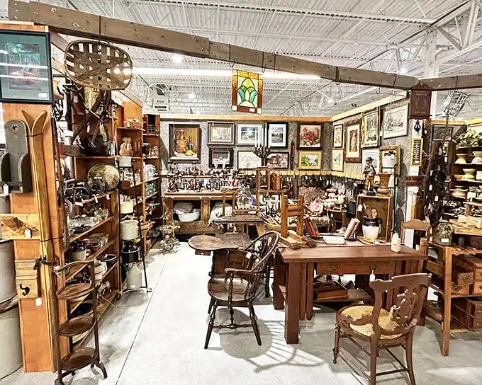 America's Antique Mall doesn't mess around! This booth looks like the furniture section from "The Brady Bunch" set—but with better lighting.