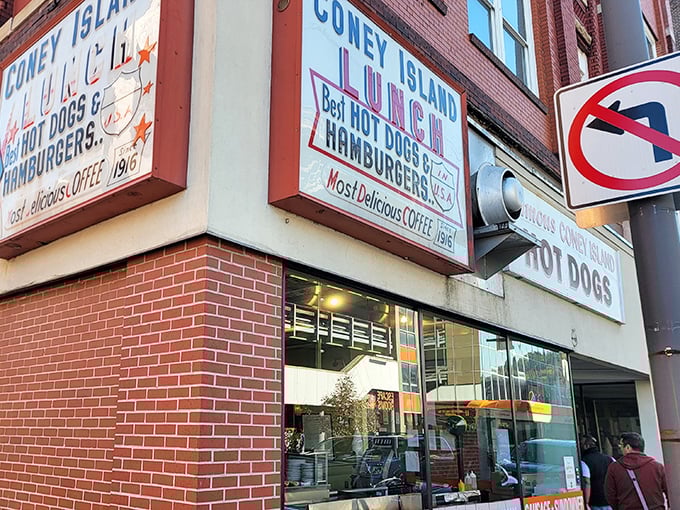 Coney Island Lunch's bold signage stands as a beacon of hope for hungry travelers – "Best Hot Dogs & Hamburgers" isn't just a claim, it's a mission statement.
