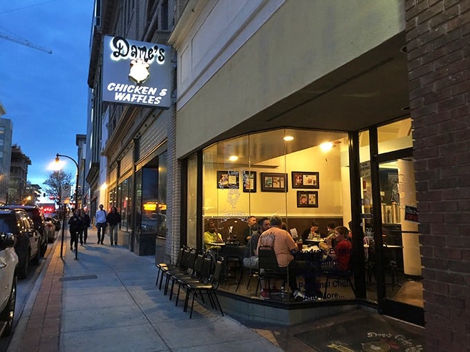 Dame's storefront whispers sweet nothings to passersby – "Psst, inside these walls, chicken meets waffle in a romance for the ages."